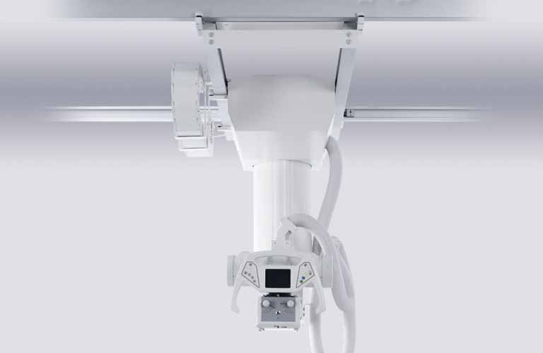Ceiling-mounted X-ray system with patient positioning table and wall stand